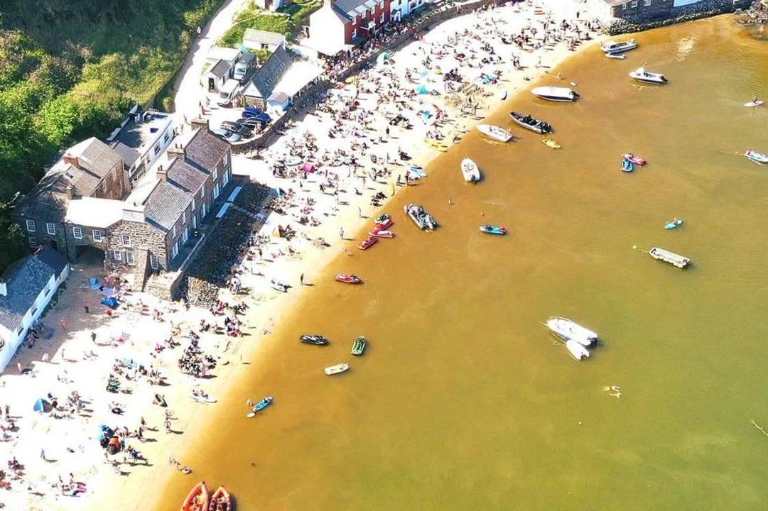 Murky beach water sewage fears quashed