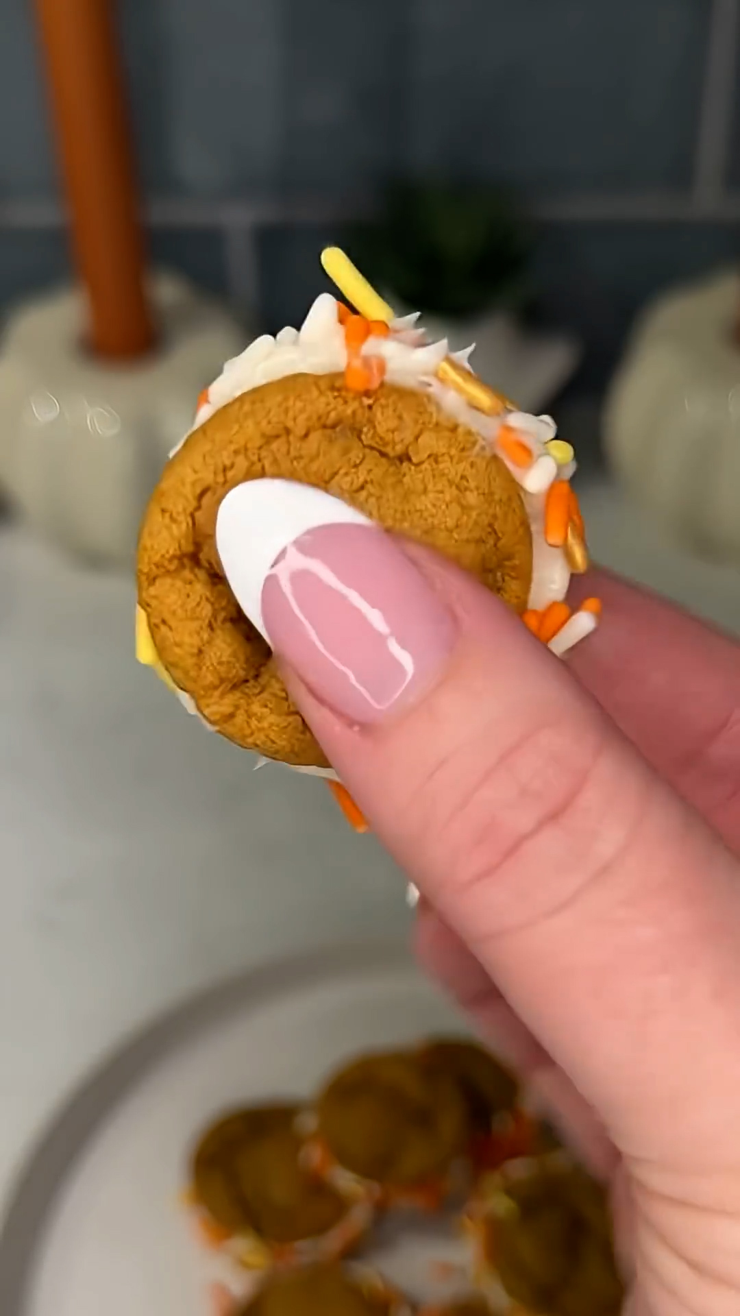 Small pumpkin cookies create sandwich with tangy center