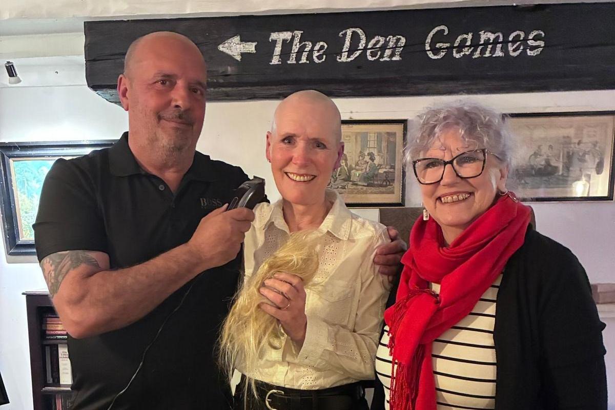Woman's pub head shave raises £4k for cancer charity
