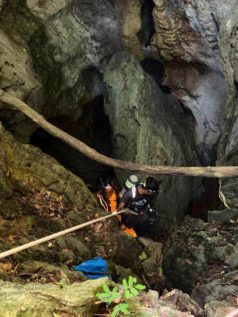 Race against time to rescue villagers trapped in flooded cave — as 5 ...