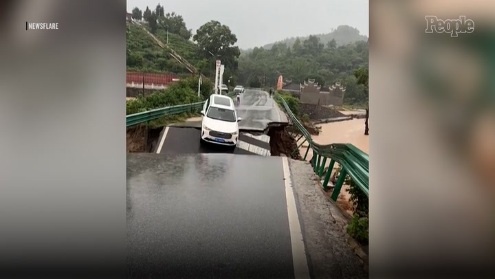 Car plunges into river before being swept away after broken bridge ...