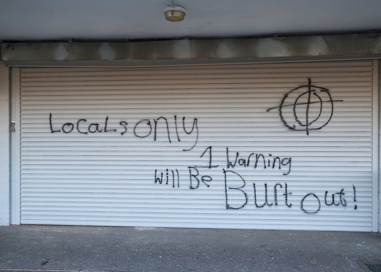 PSNI treats 'locals only' graffiti in Newtownabbey as racially ...