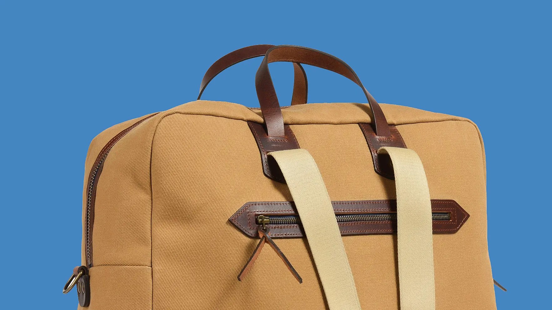 This waxed canvas pilot’s bag is your suave carry-on-only travel solution