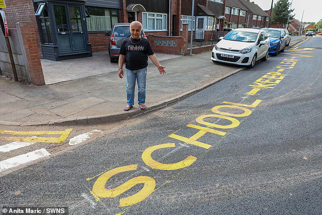 Council paints 'School keep clear' sign on street - despite there being ...