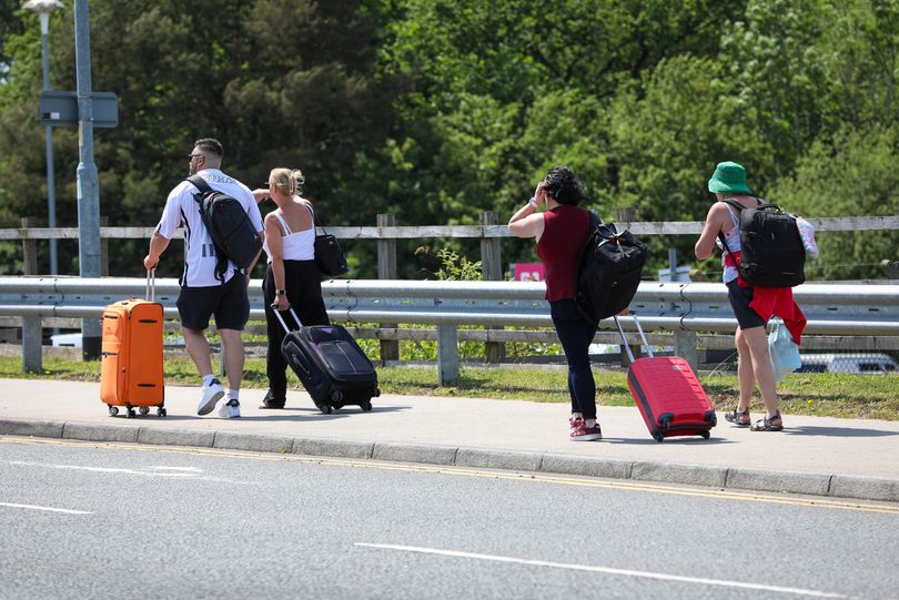 Manchester Airport chaos as holidaymakers 'ditching taxis and cars to ...