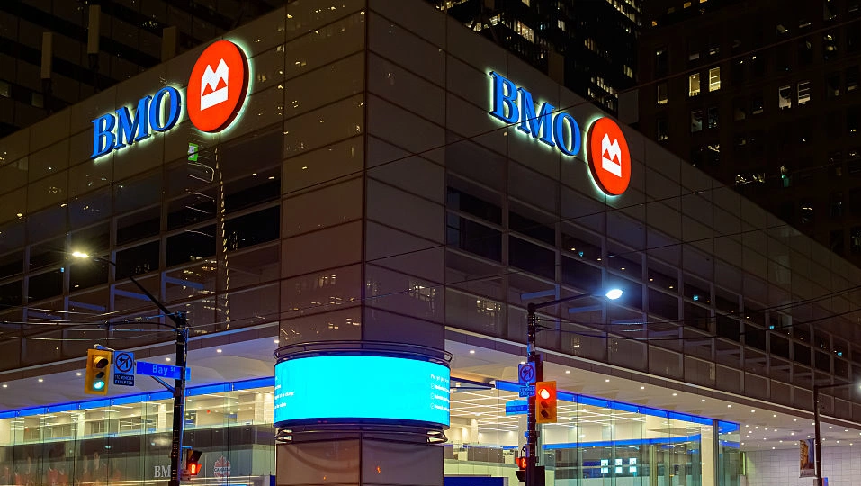 Canadian banks post profit gains despite borrower strain