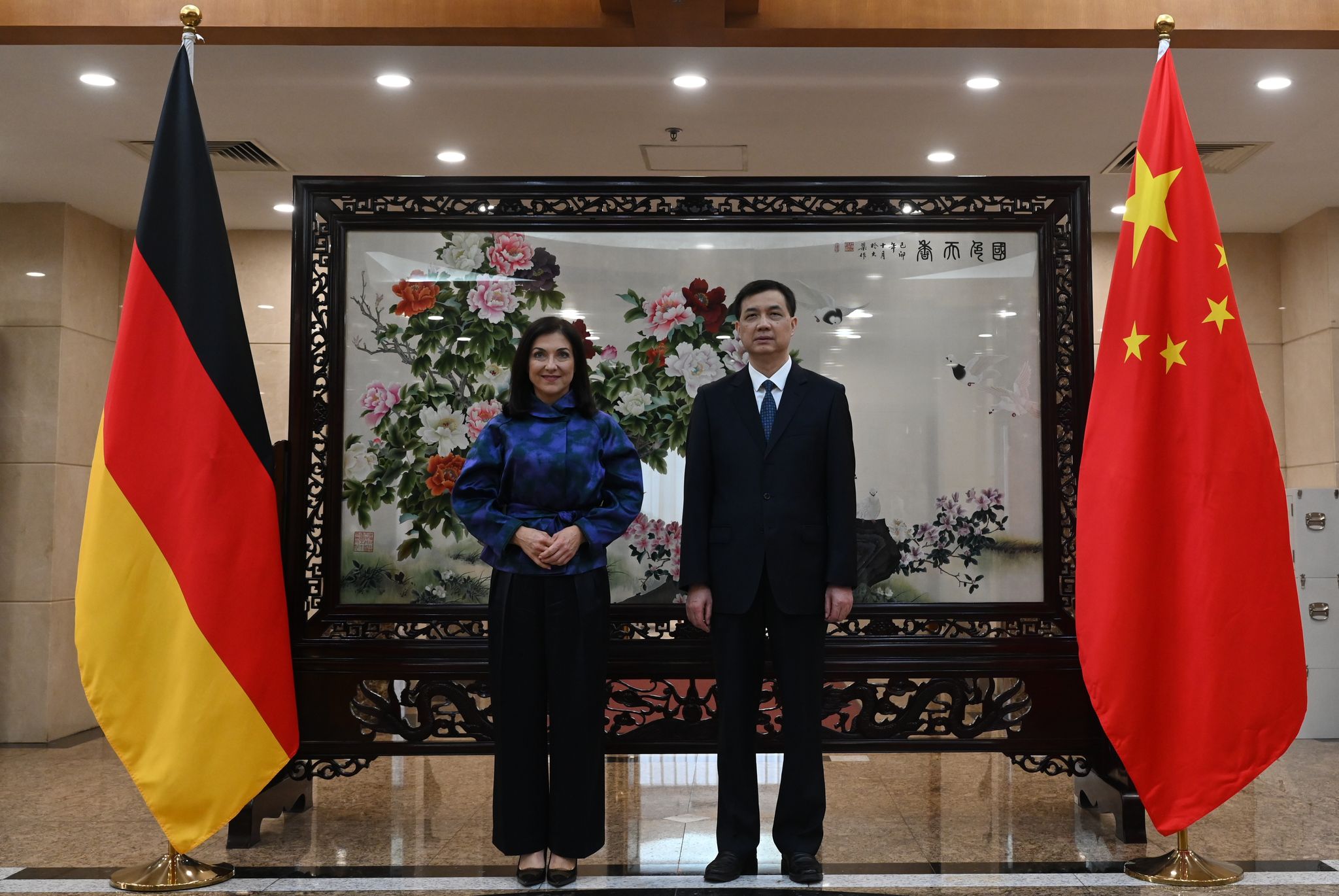 German economy minister pushes China on competition, raw materials
