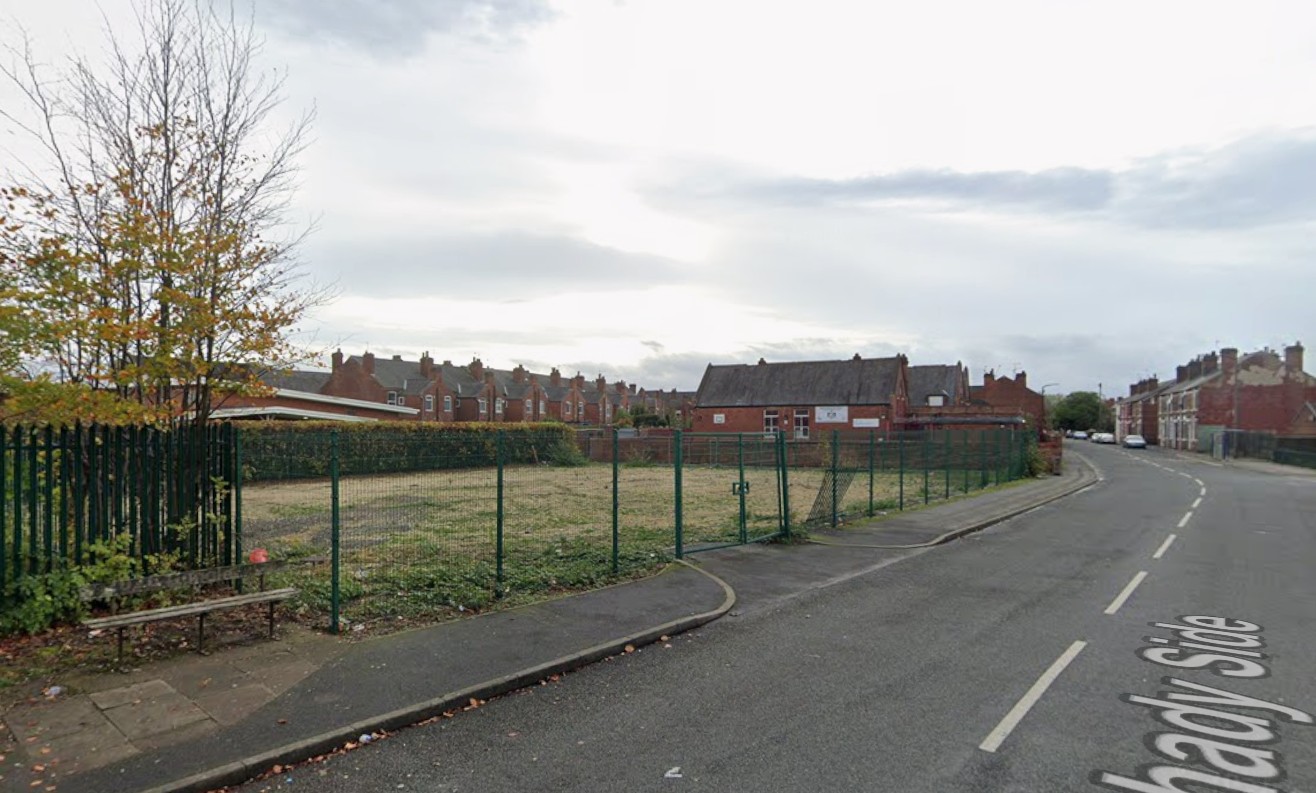 Plans for three-storey building with four shops and 11 flats ...