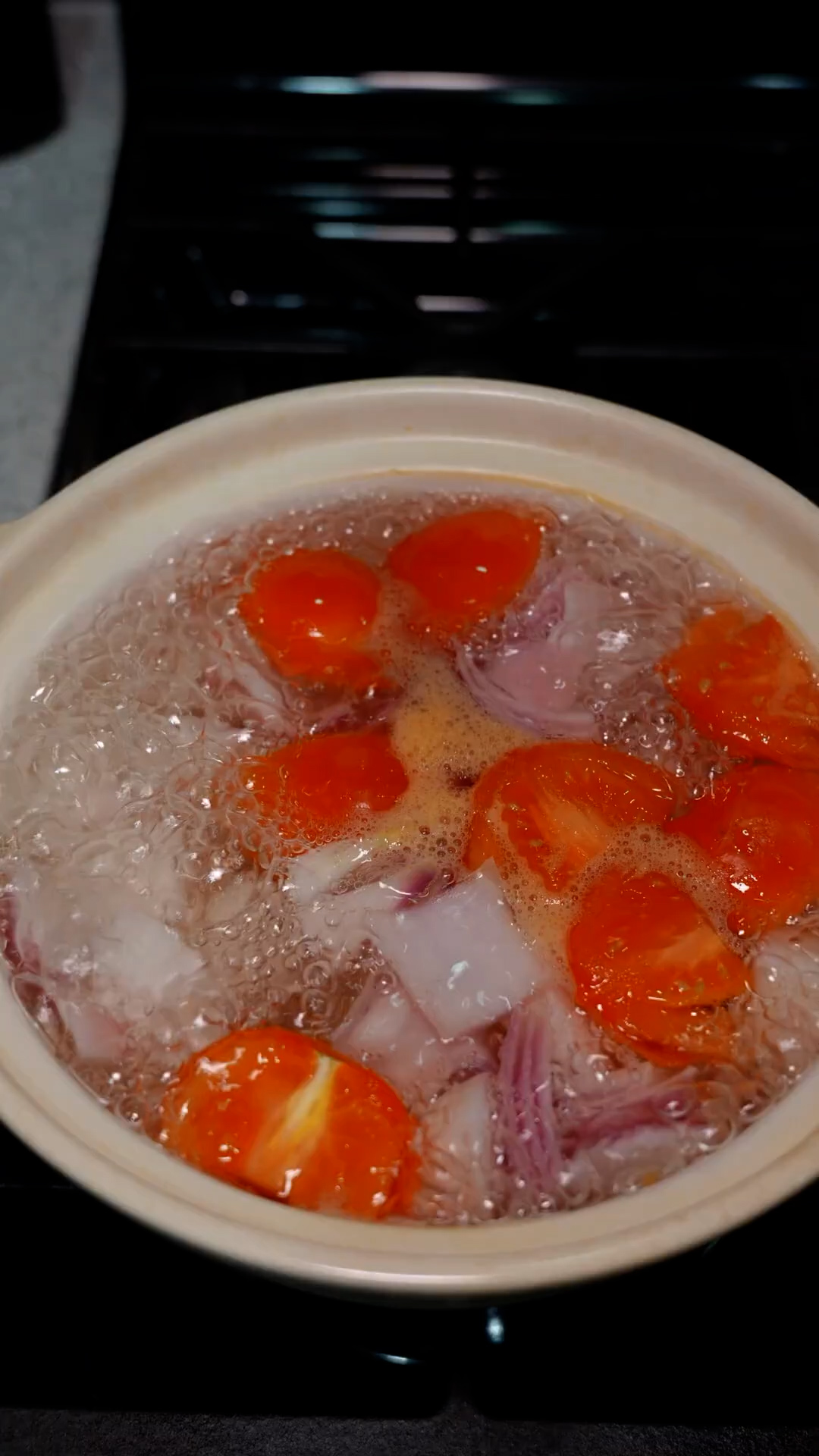 Making comforting sinigang the traditional way with real tamarind
