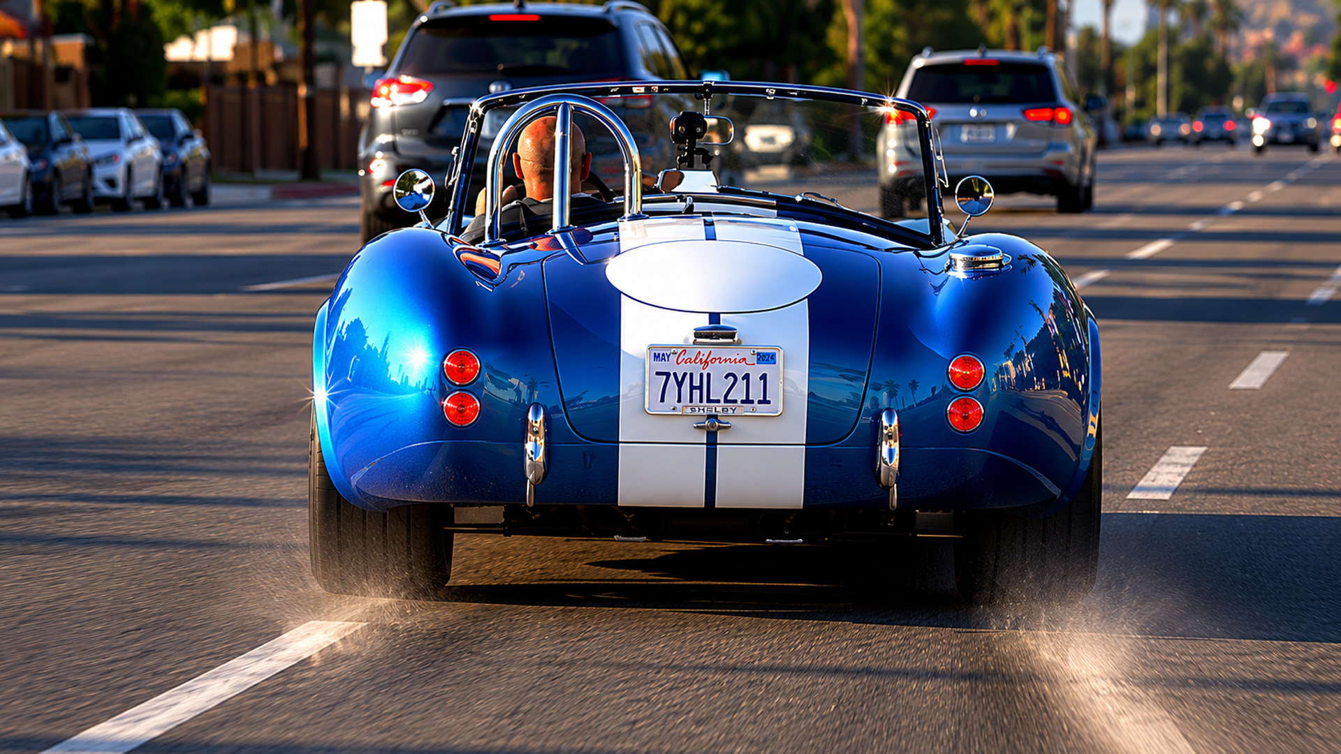 Classic Shelby Cobra launches hard on city street
