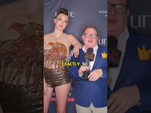 Model stuns in Diana Couture sparkly minishorts during red carpet interview