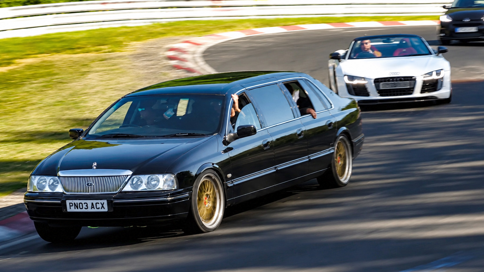 What happens when a limousine battles a supercar on track?