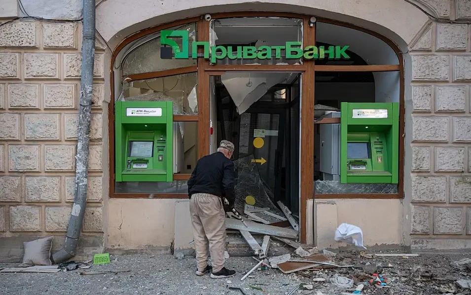 Russia lets banks arm staff to counter drone attacks