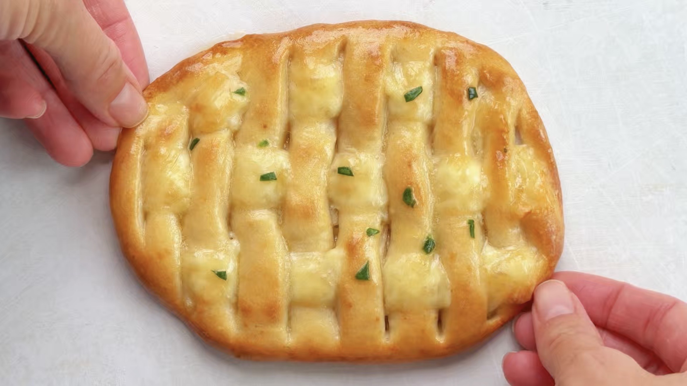Cheesy woven garlic bread