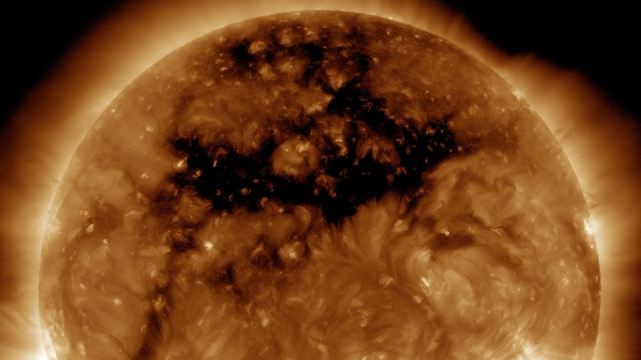A coronal hole on the sun is pointing a fast stream of solar wind right ...