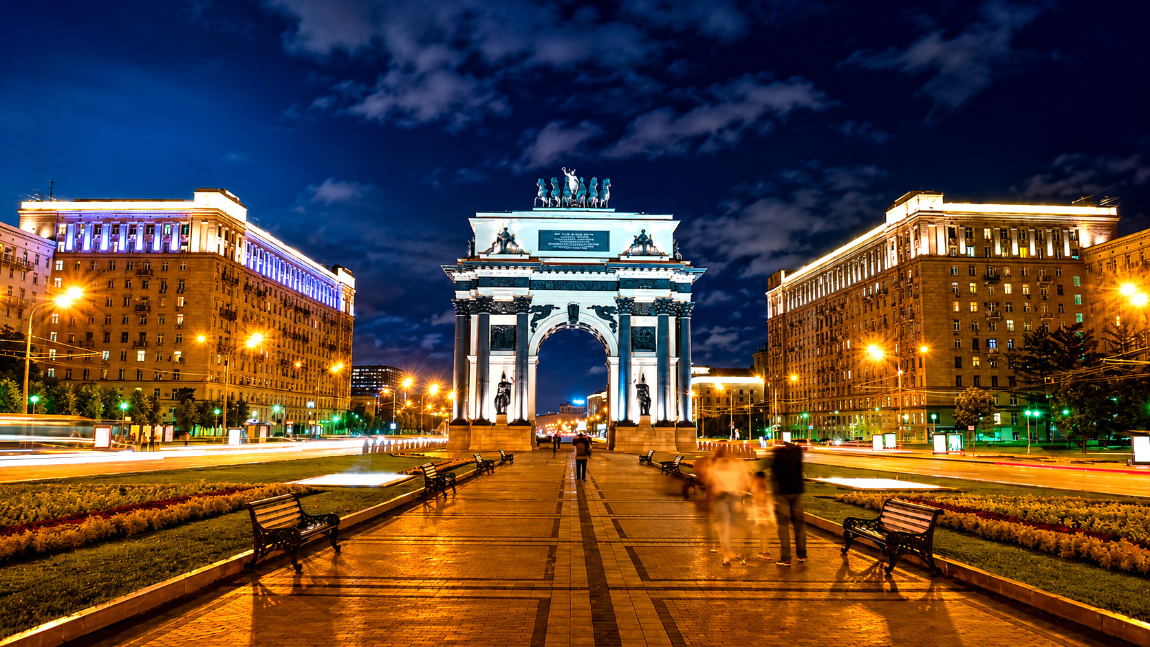 Moscow’s historic victory arch glowing in the night
