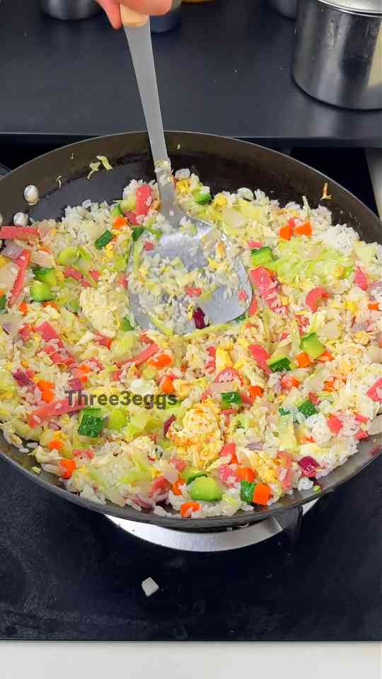 Egg fried rice gets even better with bacon or sausage
