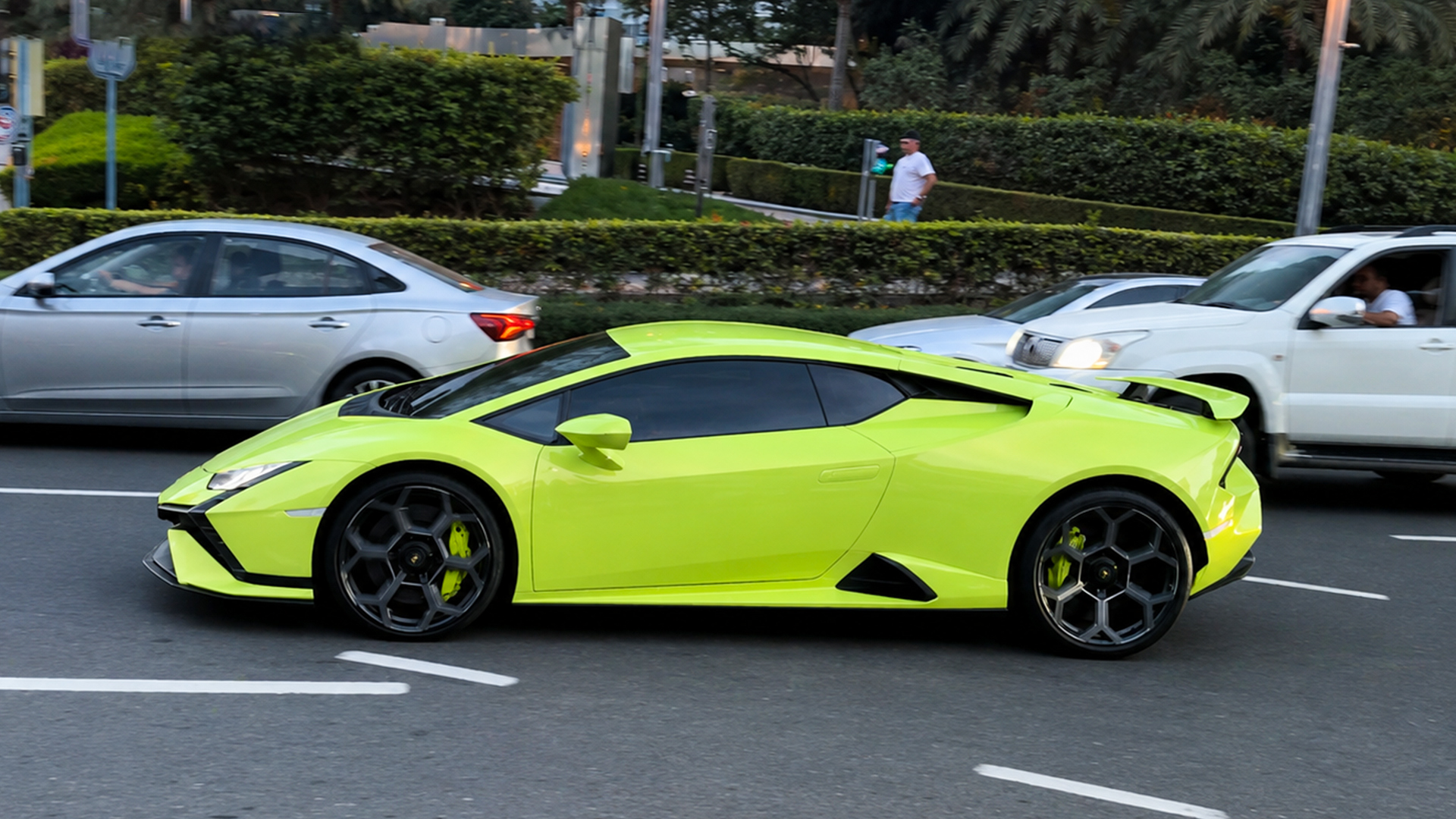 Dubai millionaire cruising in lime green Lamborghini Huracan