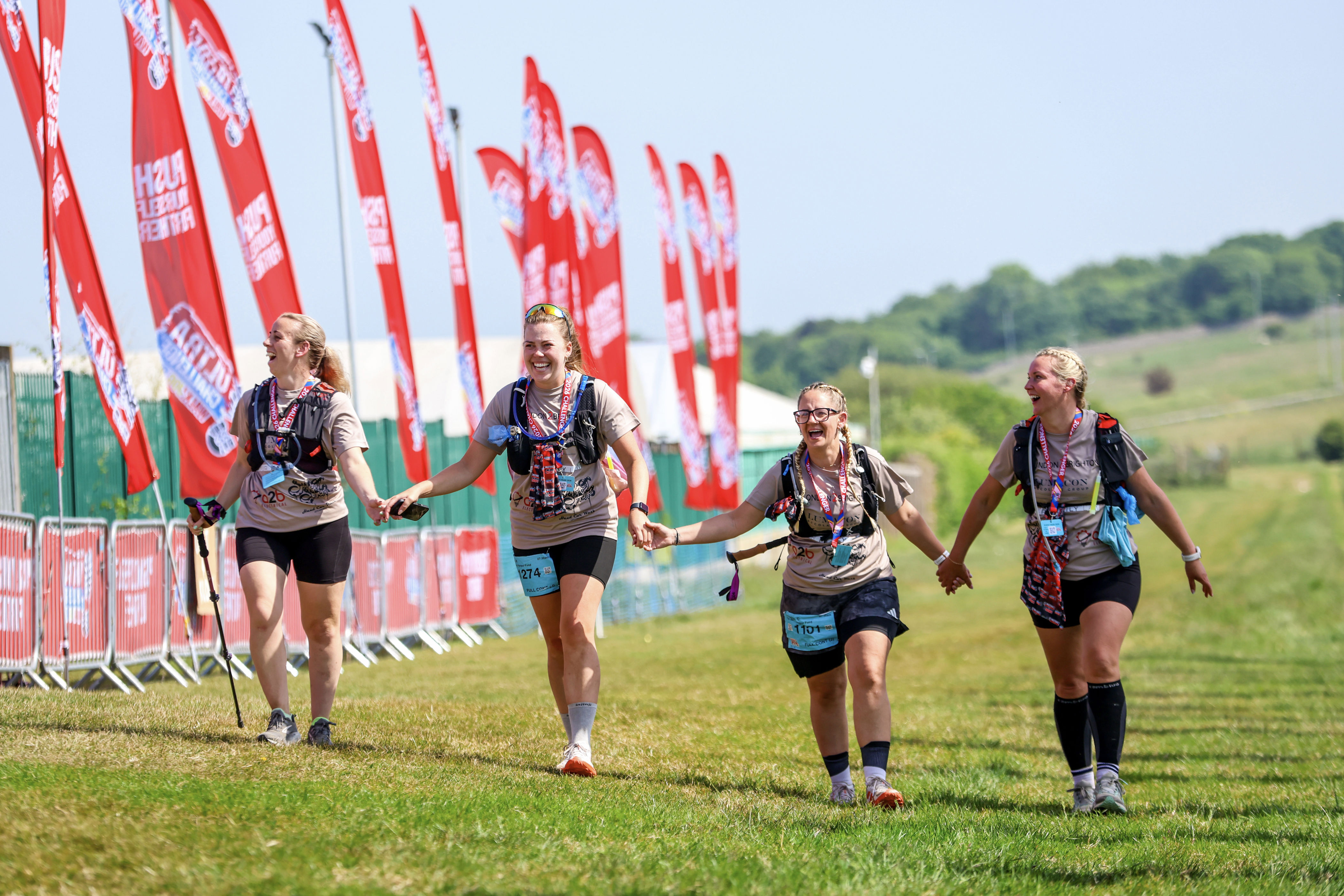 Thousands take on London to Brighton challenge in summer heat as ...