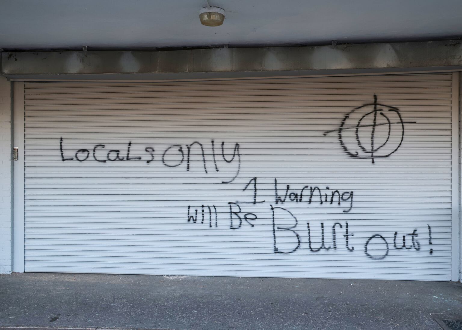 PSNI treats 'locals only' graffiti in Newtownabbey as racially ...
