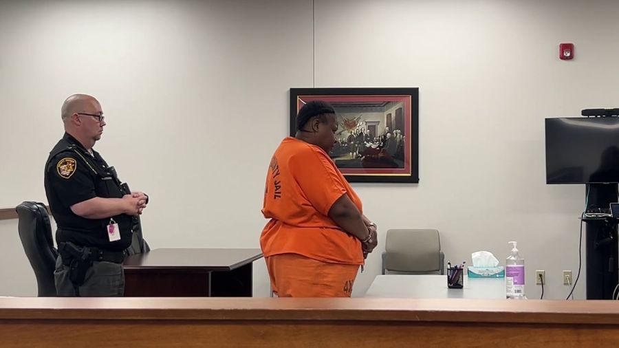 Hearing continued for woman charged after body found in home
