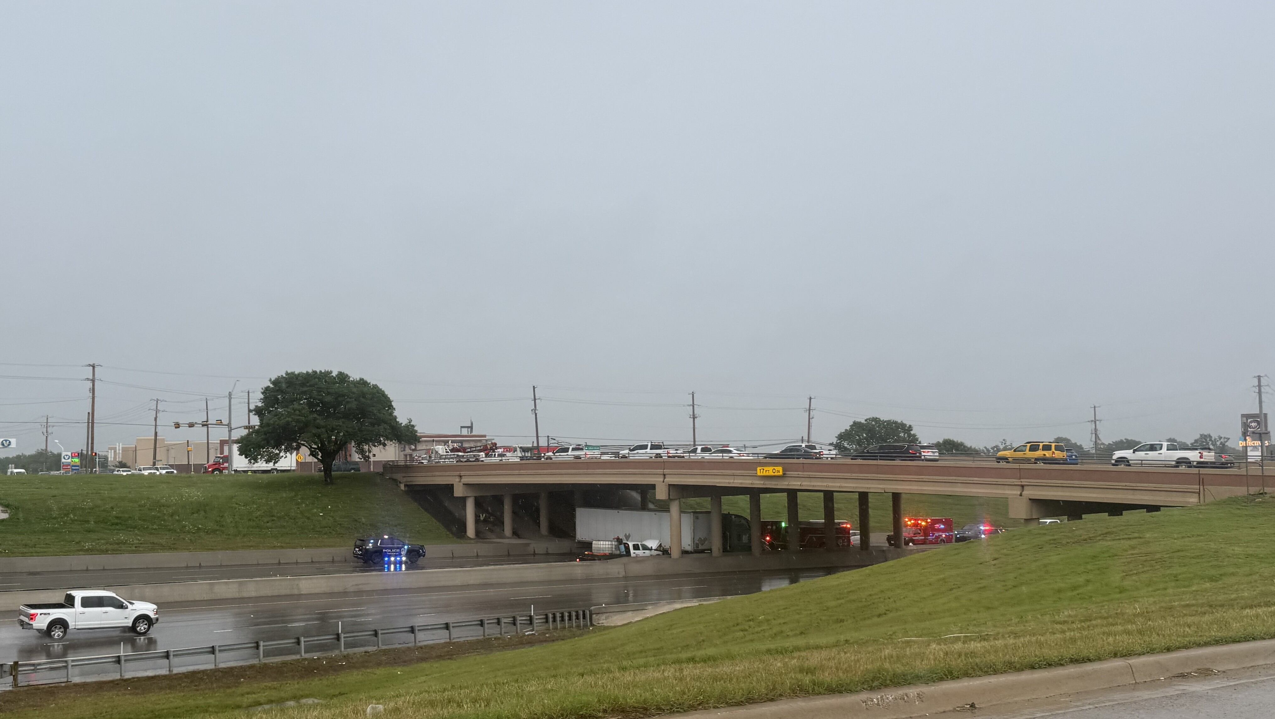 Jackknifed semi-truck blocks traffic on northbound US-75 entering Sherman