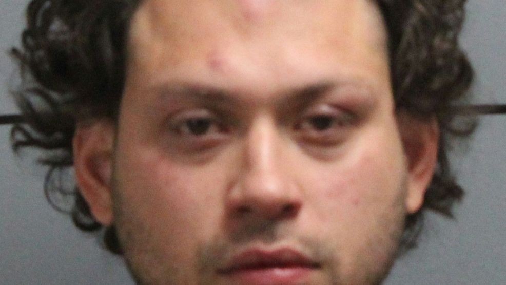 Man arrested after threatening, attempting to bite officers