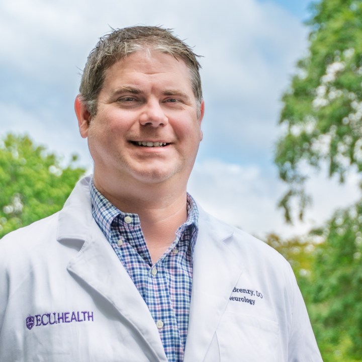 ECU doctor on plane aids legally blind woman from chest pain