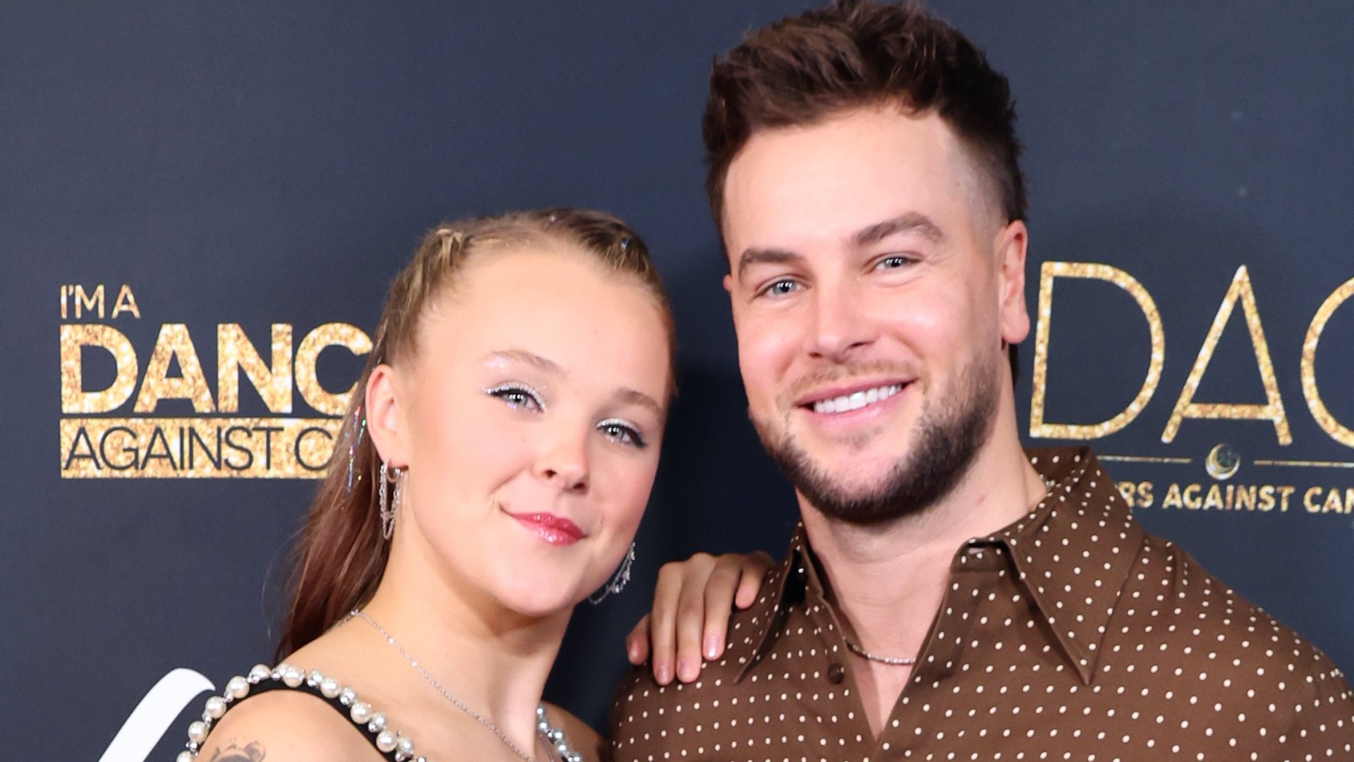 Chris Hughes details 'tricky' long-distance relationship with JoJo Siwa