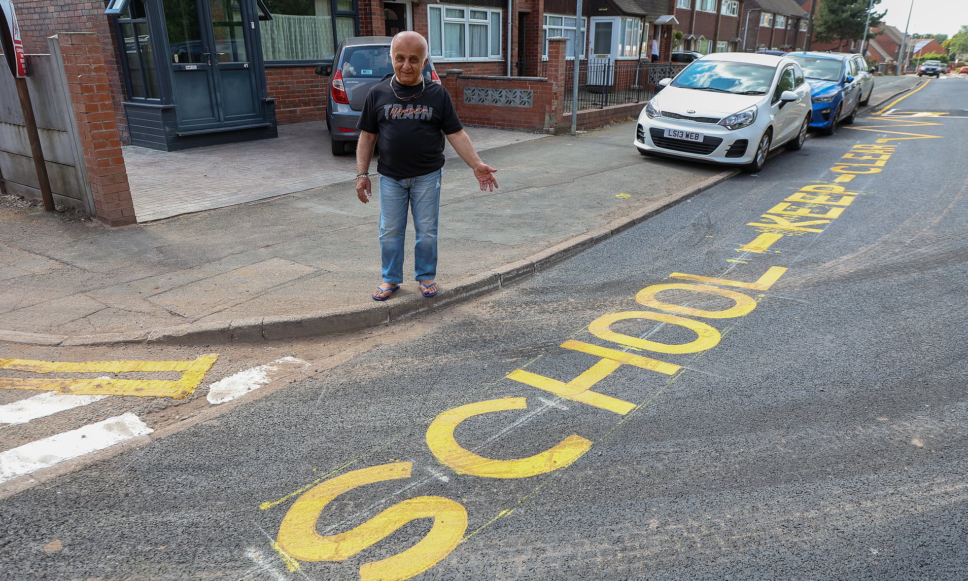Council paints 'School keep clear' sign on street - despite there being ...