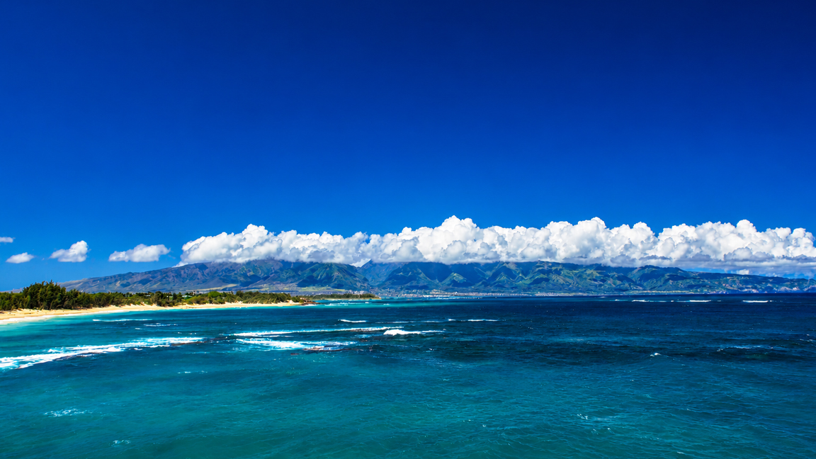 The calm waters hiding a wild island beyond the horizon