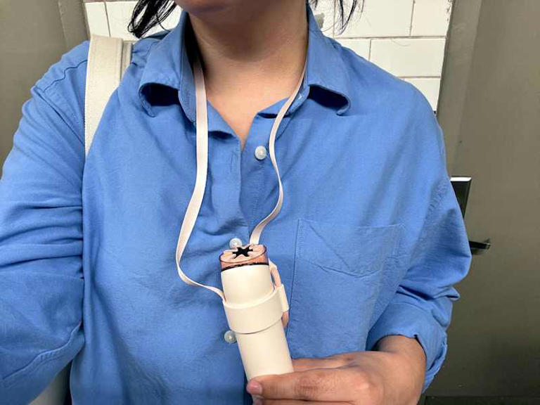 I tried Dyson's new handheld fan, and it made my sweaty subway commute ...