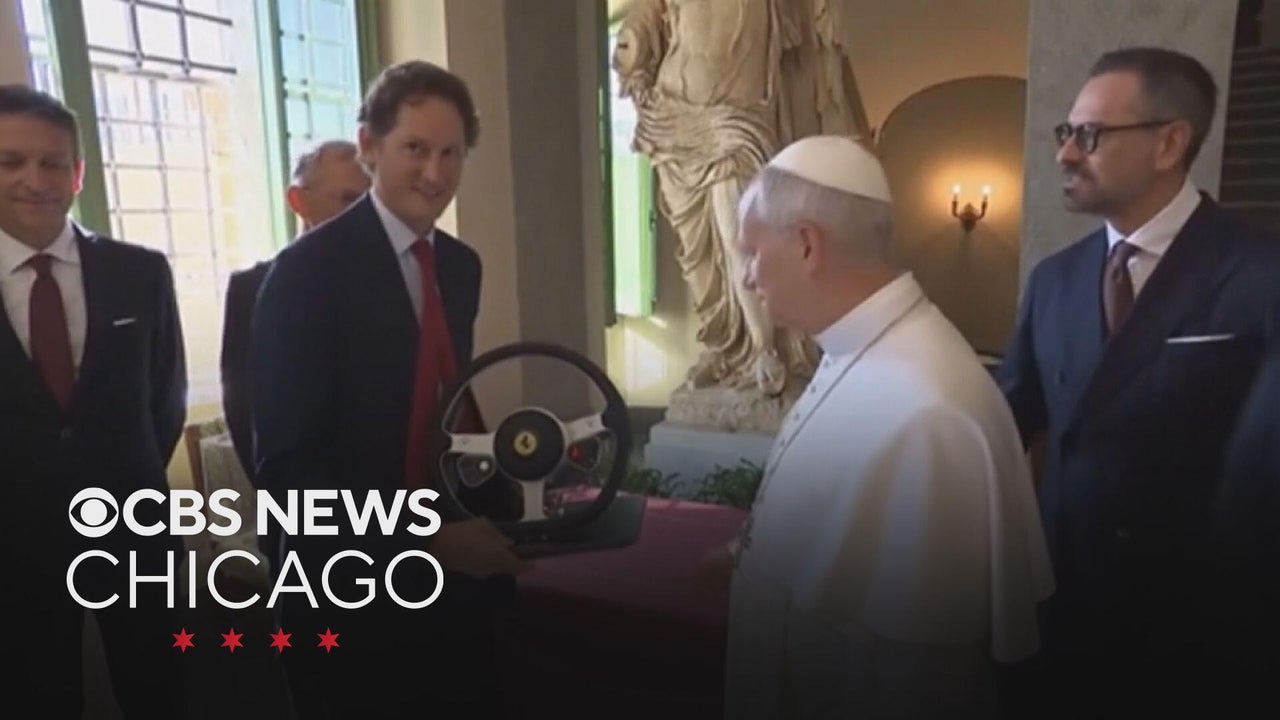Ferrari CEO presents Pope Leo XIV with steering wheel from all-electric car