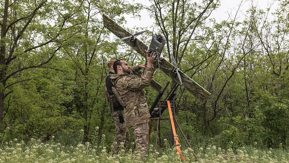 Russia lets banks arm staff to counter drone threats