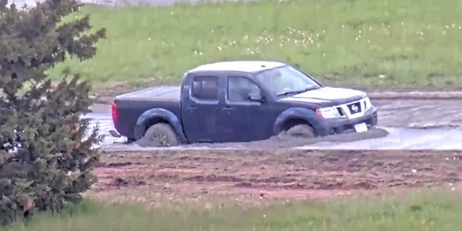 Nissan Frontier driver in Wisconsin discovers 'road closed' barriers ...