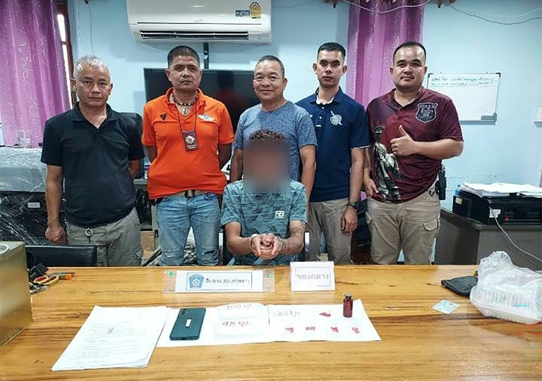 Thai cop says viral image of policemen in dresses is fake