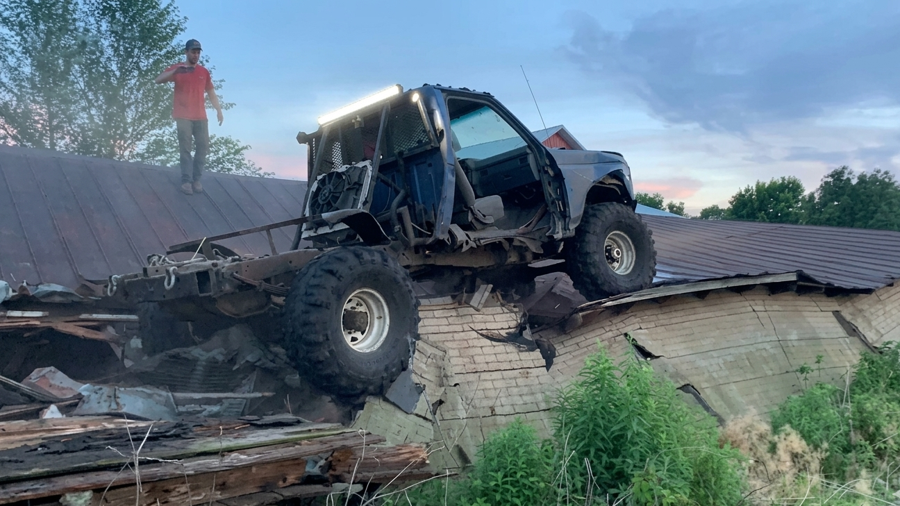 He couldn't park his truck - so he drove it onto a barn roof