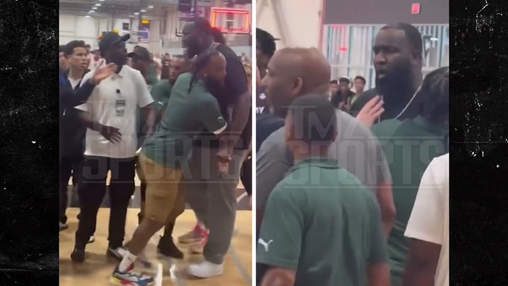 Kendrick Perkins held back in heated argument at son's AAU game