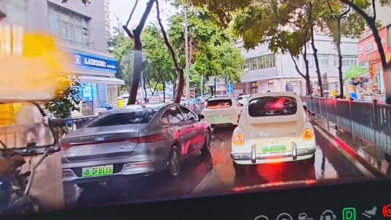 Man rides reclining hospital bed through traffic in Sichuan, China