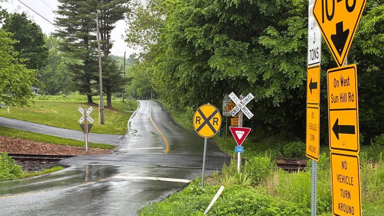 Several injured after school bus crash near railroad tracks in ...