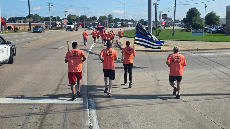 Area law enforcement officers participate in Torch Run for Special ...