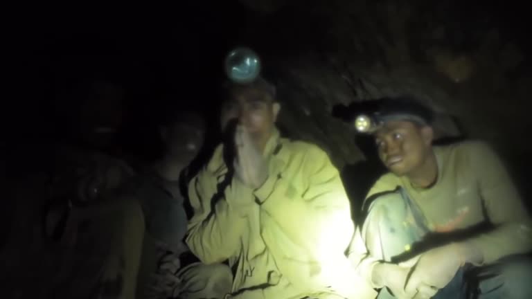 GoPro footage shows moment of rescue for people trapped in Laos cave