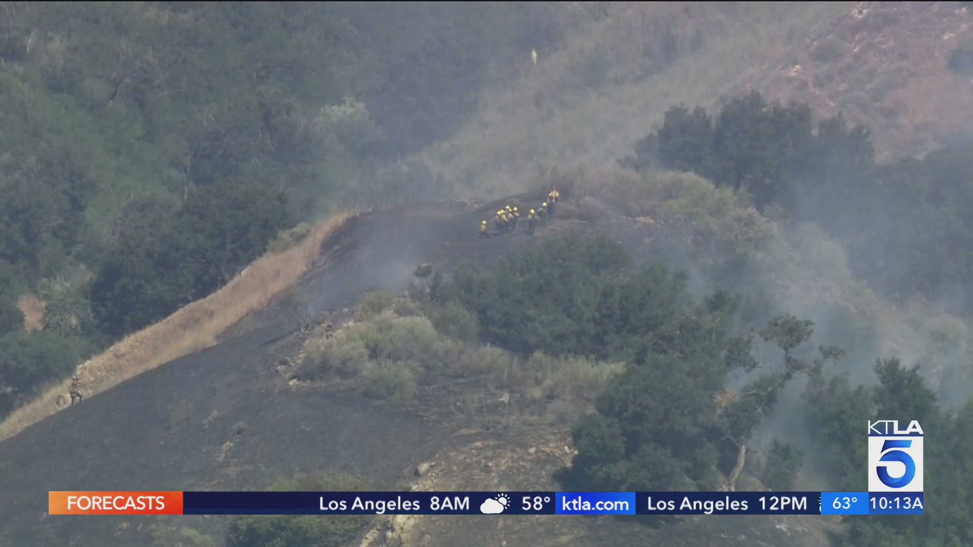 Brush fire burning near Malibu Canyon Road in Calabasas