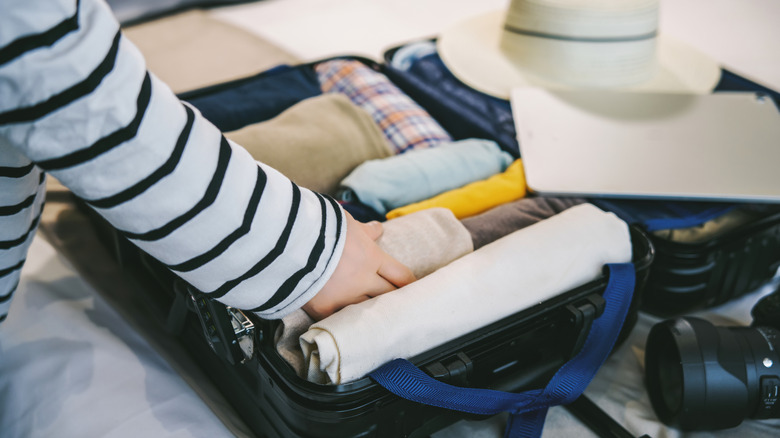 Save tons of space in your luggage with these game-changing packing hacks