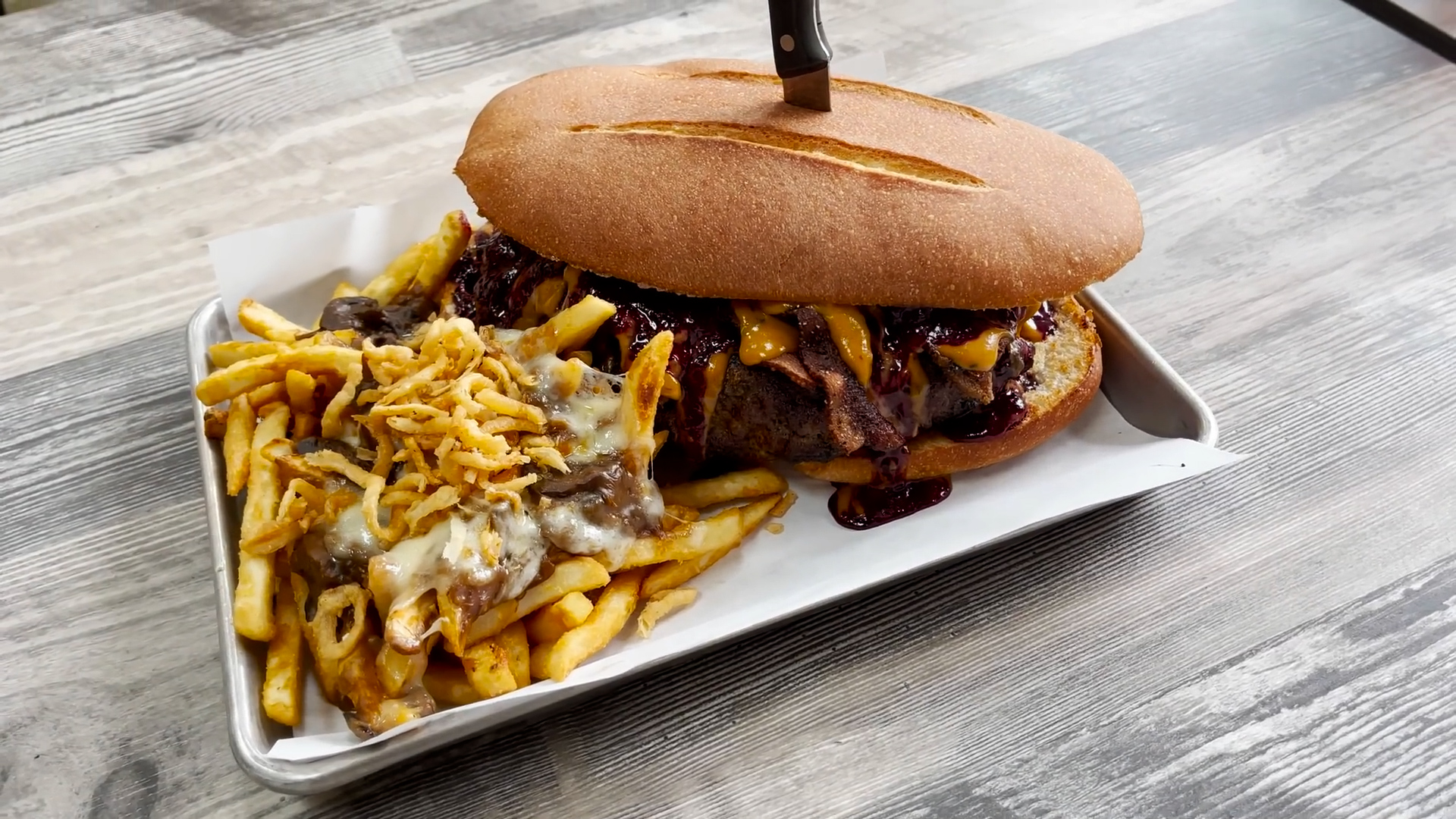 He takes on El Gigante, the biggest peanut butter jelly burger ever
