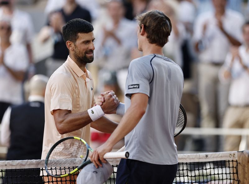 Tennis - Djokovic battles past French hope Royer to reach third round