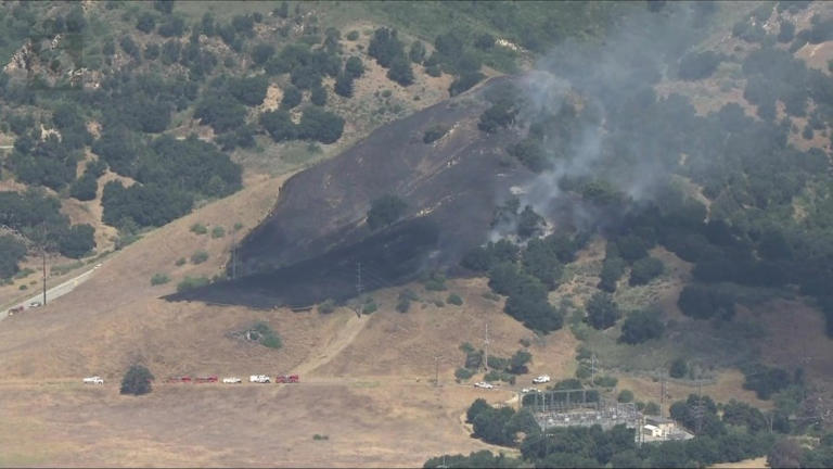 Crews work to contain brush fire near Malibu Canyon Road in Calabasas