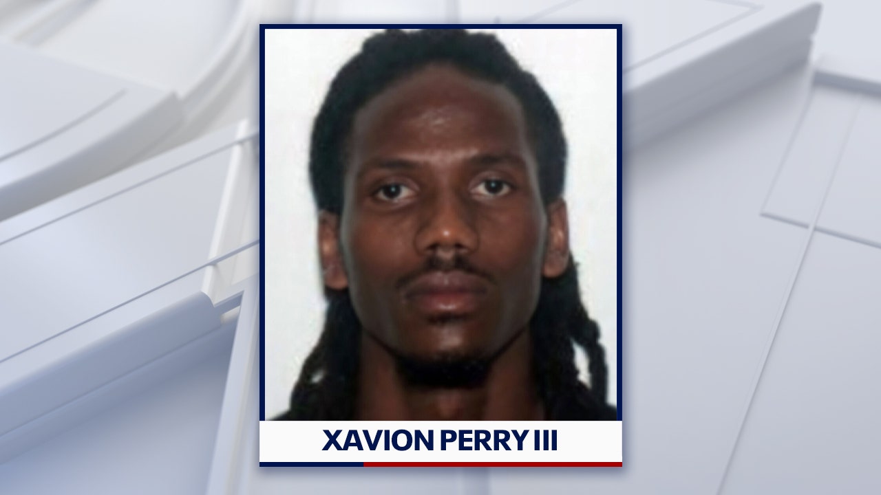 Officials confirm body found on Volusia County beach as wanted murder ...