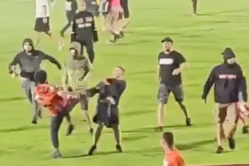 Balaclava hooligans storm pitch and attack their own players – wild ...