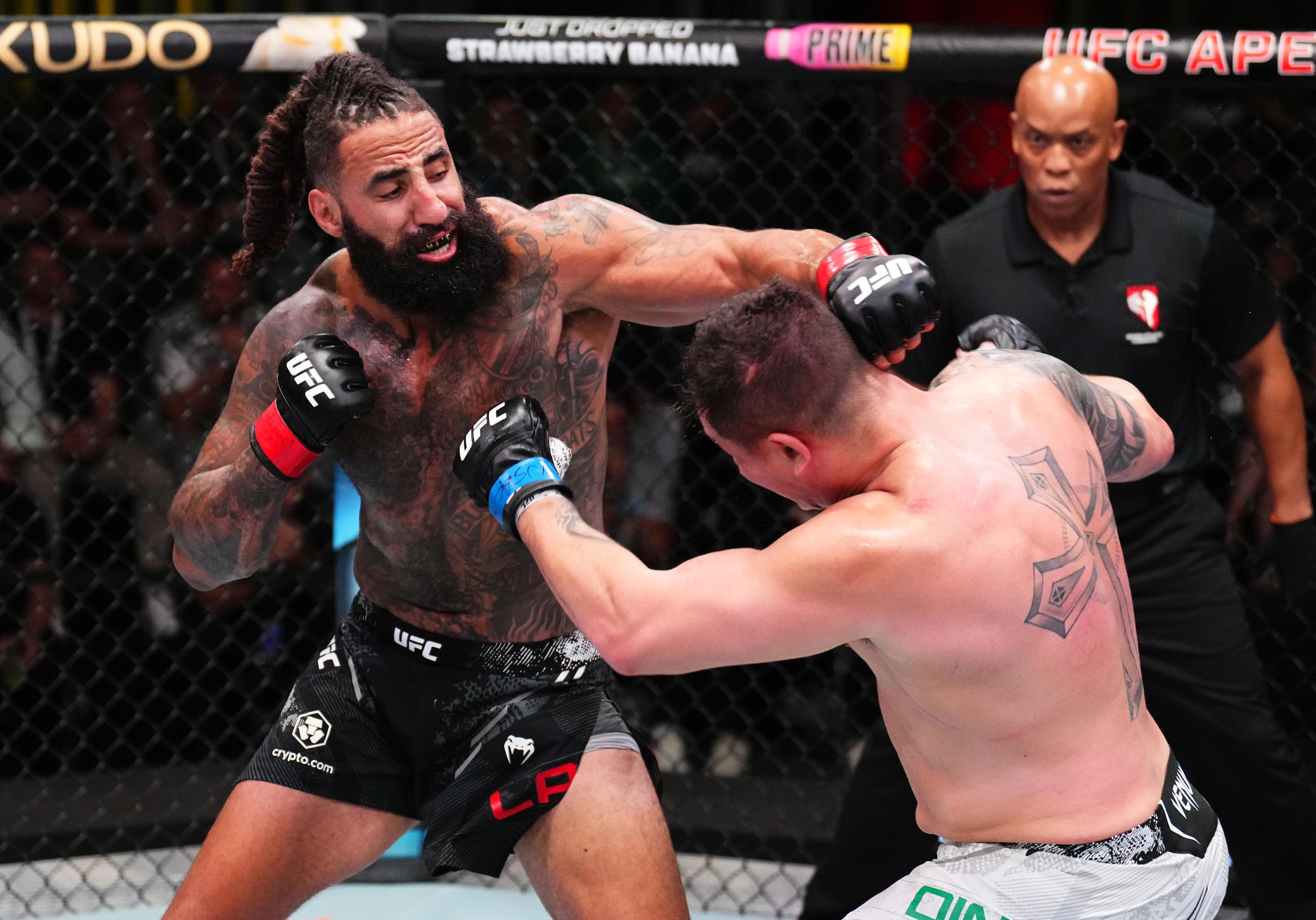 Former NFL player Austen Lane retires from UFC after 7 fights